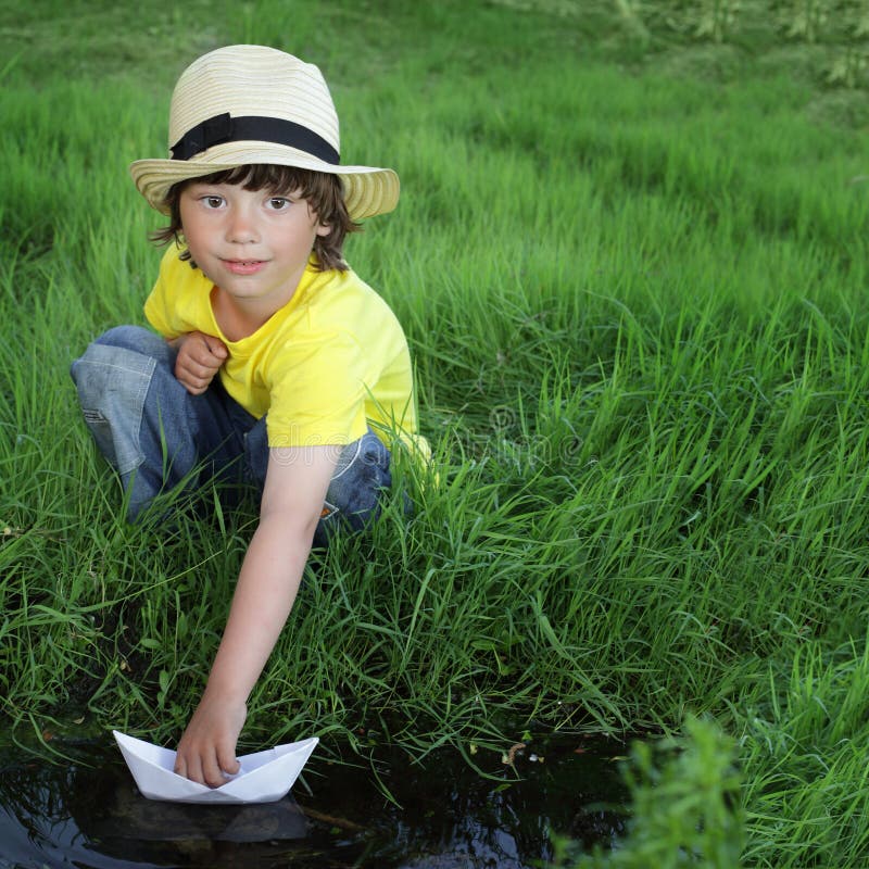 Happy Smiling Little Boy Play in Water Drops from Irrigation Hose Stock ...