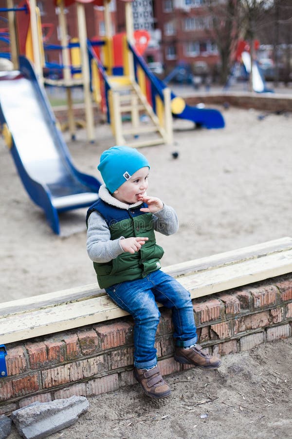 Little boy on playground stock photo. Image of childhood - 54139726