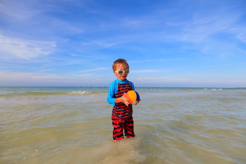 Little Boy Playing Ball on the Beach Stock Image - Image of healthy ...