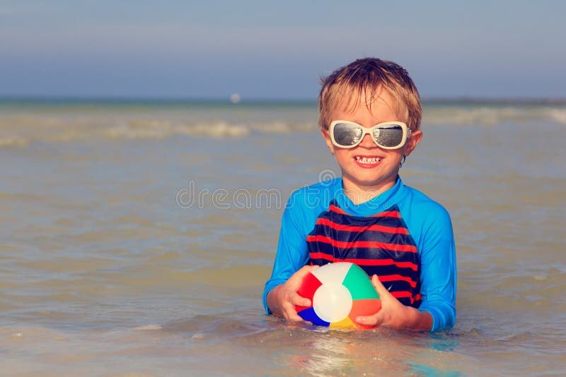 Little Boy Playing Ball on the Beach Stock Photo - Image of smile ...