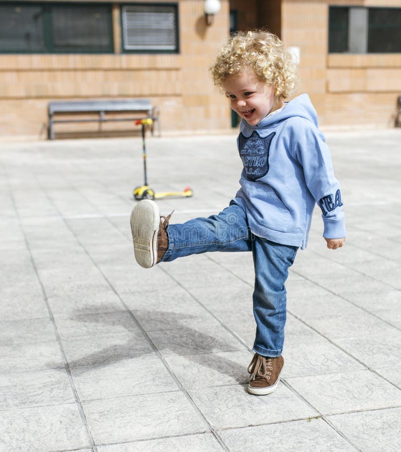 Little boy playing ball stock photo. Image of ball, young - 52456676