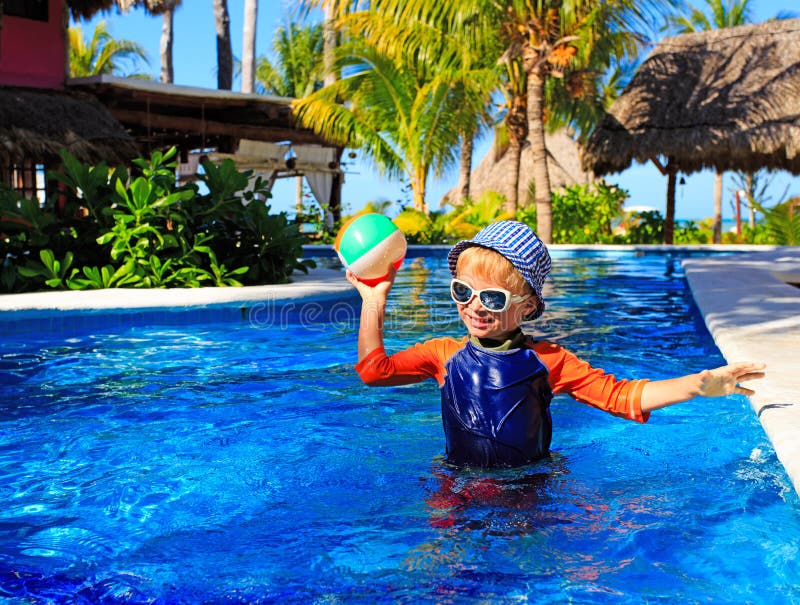 Little Boy Playing Ball in Swimming Pool on Beach Stock Image - Image ...