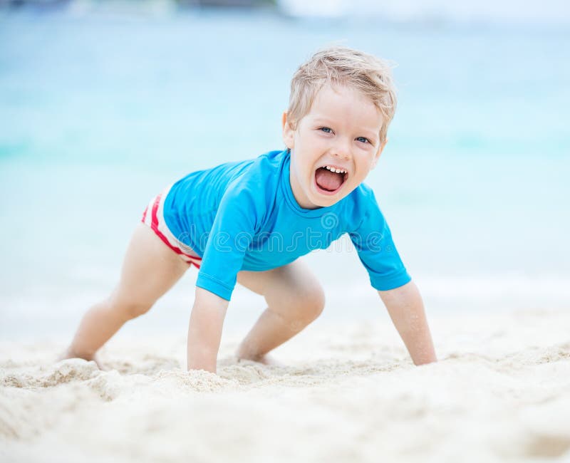 Little Boy Playing on the Beach Stock Photo - Image of leisure ...