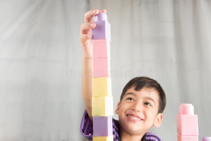 Little Boy Playing Blocks at Home Stock Photo - Image of colorful ...