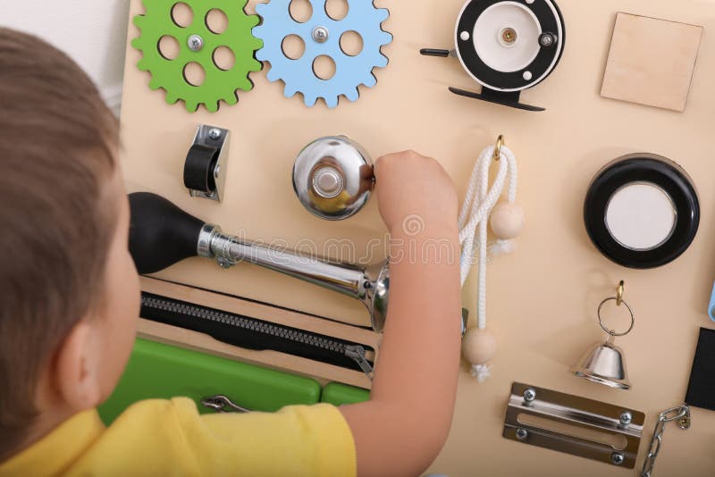 Little Boy Playing with Busy Board, Focus on Hand Stock Image - Image ...