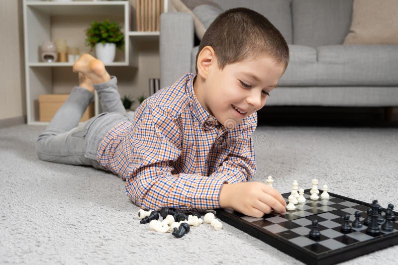 Little Boy Playing Chess. Board Games for Children Stock Photo - Image ...