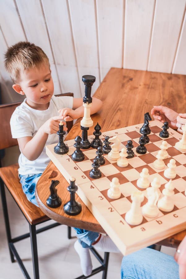 Little Boy Playing Chess at Home at the Table Stock Image - Image of ...