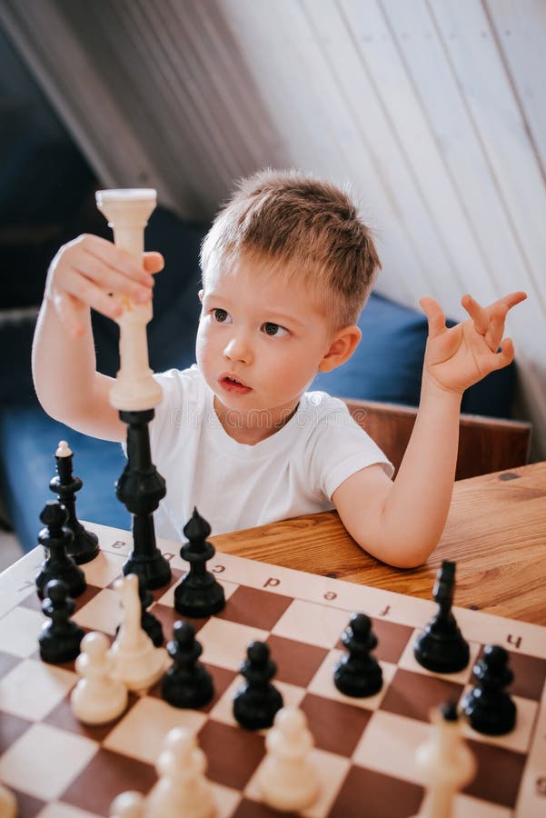 Little Boy Playing Chess at Home at the Table Stock Image - Image of ...