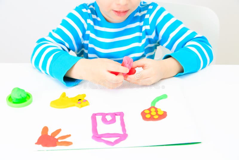 Little Boy Playing with Clay Dough, Education and Stock Photo - Image ...