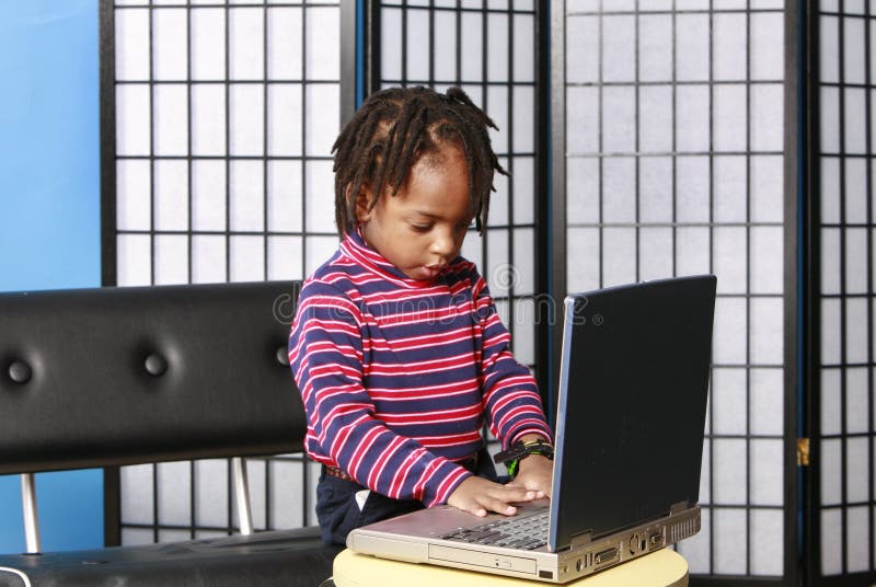 Little Boy Playing with a Computer Stock Image - Image of computer ...
