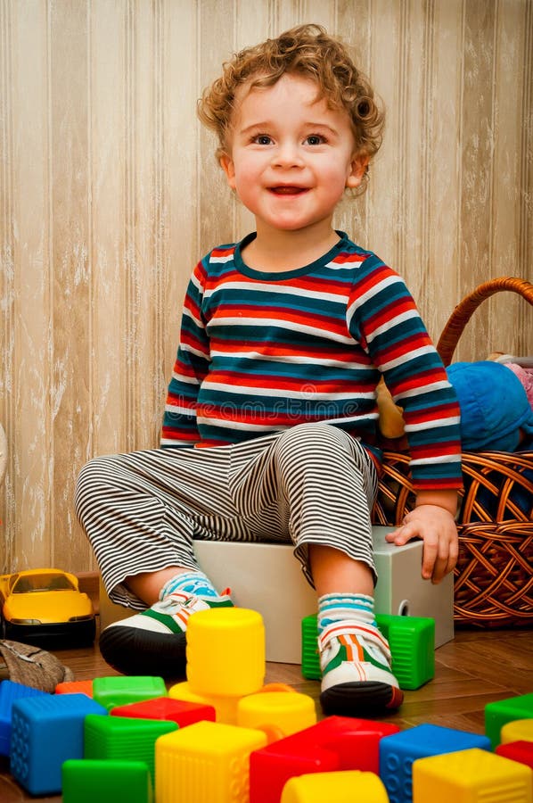 Little Boy Playing with Cubes Stock Photo - Image of building, blocks ...