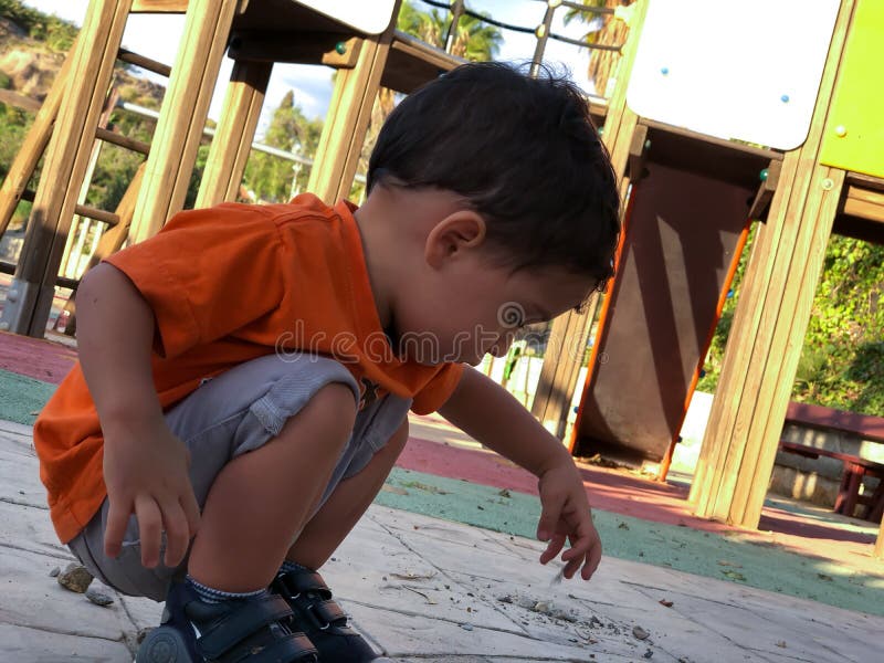Little Boy Playing with Dirt in a Playground Stock Photo - Image of ...