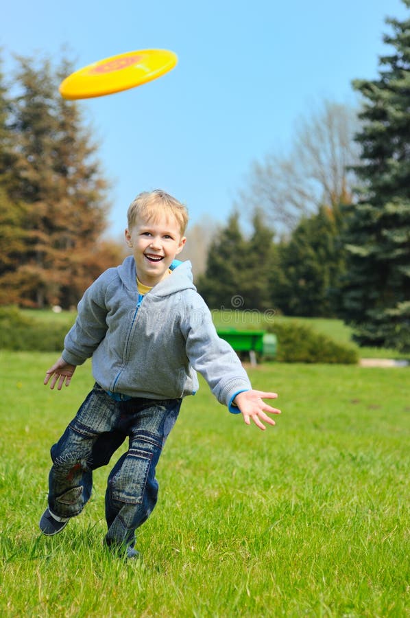 Little Boy is Playing Frisbee Stock Photo - Image of exercise ...