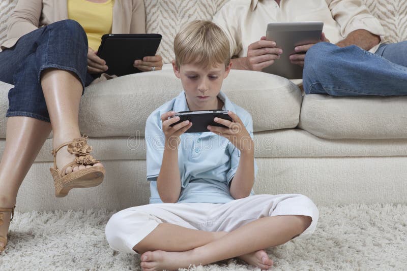 Little Boy Playing Games on PSP Stock Photo - Image of childhood ...
