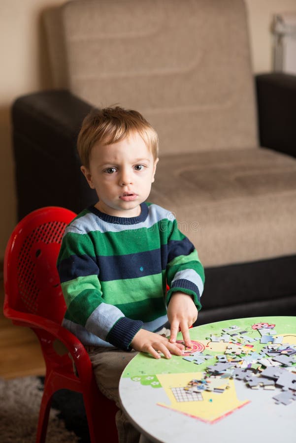 Little Boy Playing with Puzzle Stock Image - Image of playing ...