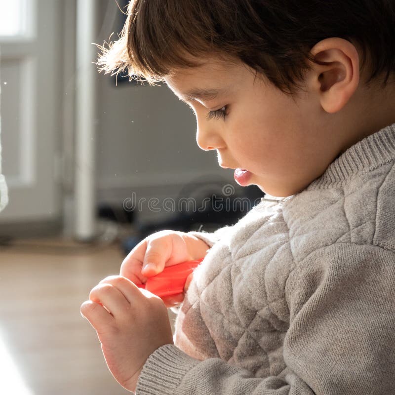 Little boy playing at home stock photo. Image of interior - 212042636