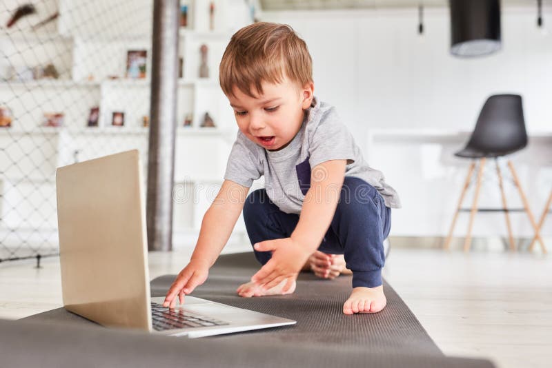 Little Boy Playing with a Laptop Computer Stock Photo - Image of ...