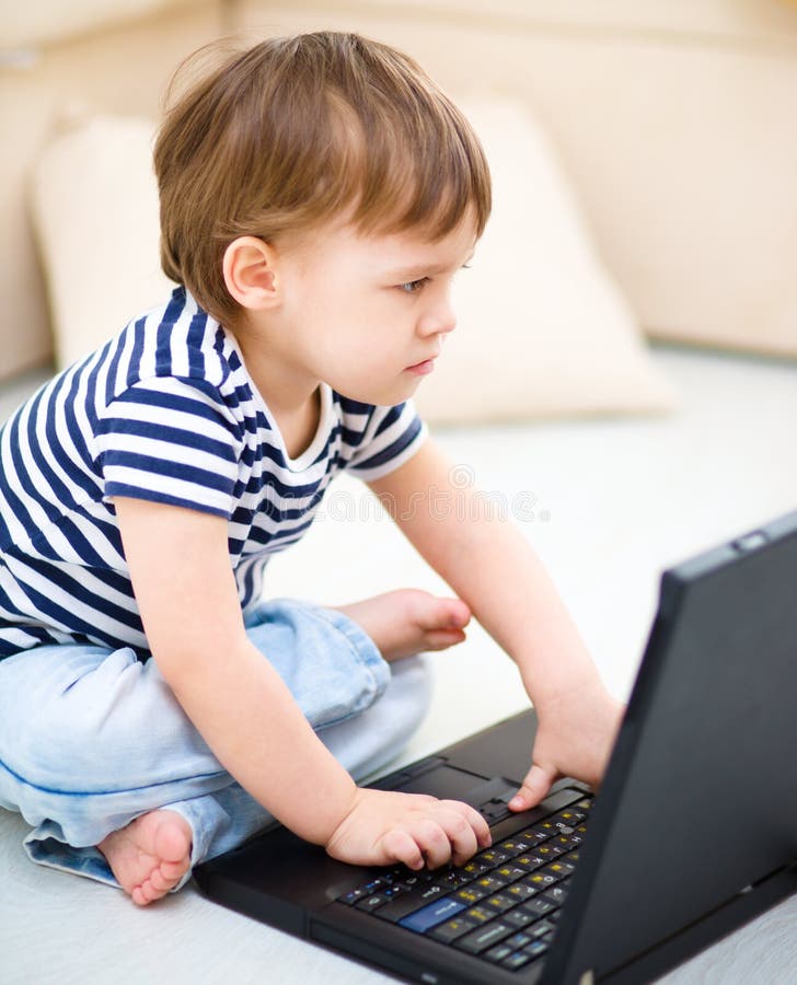 Education, Technology Internet - Little Boy with Laptop Stock Photo ...