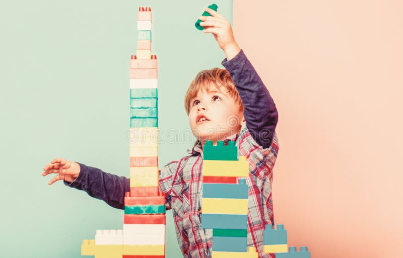 Little Boy Playing with Lots of Colorful Plastic Blocks Constructor ...