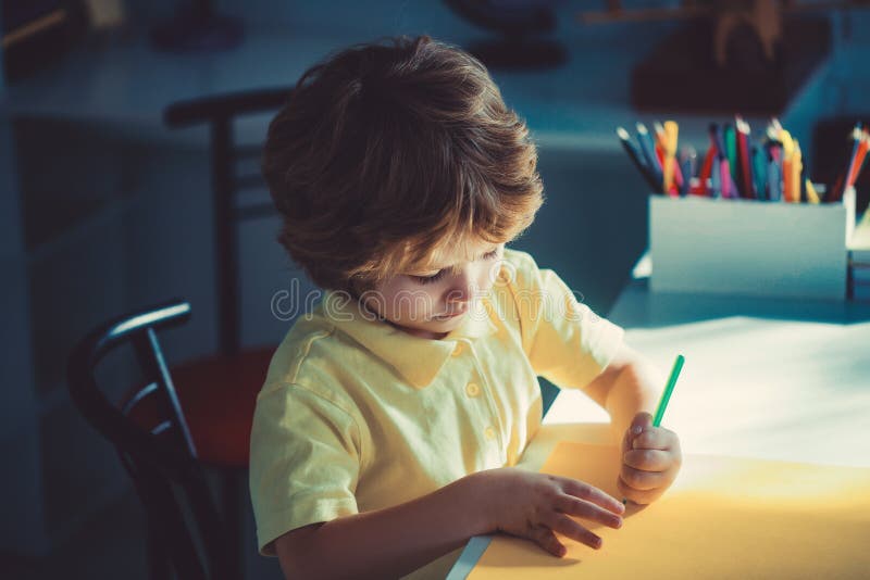 Little Boy is Playing with Pencils Indoors. Stock Image - Image of ...