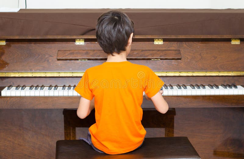 Asian Kid Boy Playing the Piano in the Room Stock Image - Image of ...