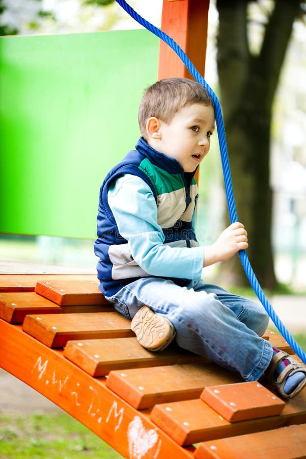 Little Boy is Playing on Playground Stock Photo - Image of kindergarten ...