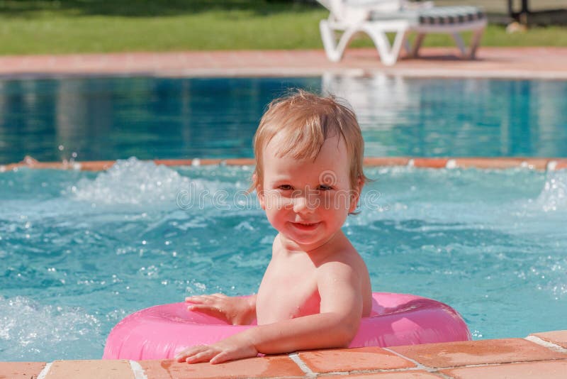 Little Boy Playing in the Pool Stock Photo - Image of preserver, child ...