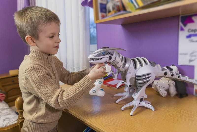 Little Boy Playing with Robots Stock Photo - Image of people, happy ...