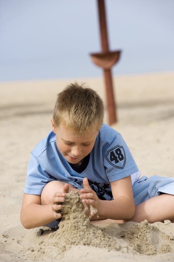 Little boy on the sand stock photo. Image of child, sand - 9875142