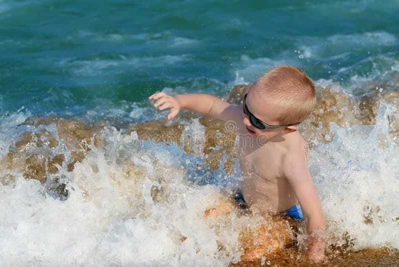 Little Boy Playing on the Beach Stock Photo - Image of child, outside ...