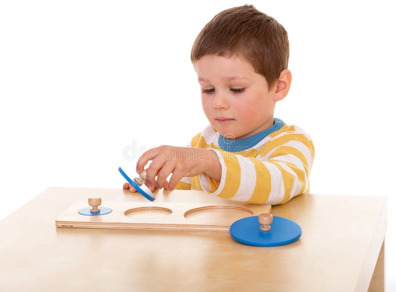 Little Boy Playing at the Table Stock Photo - Image of playschool, male ...