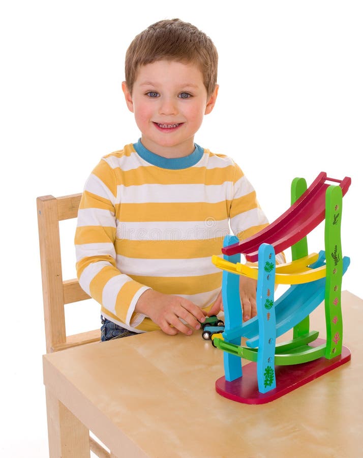 Little Boy Playing at the Table Stock Image - Image of vertical, table ...