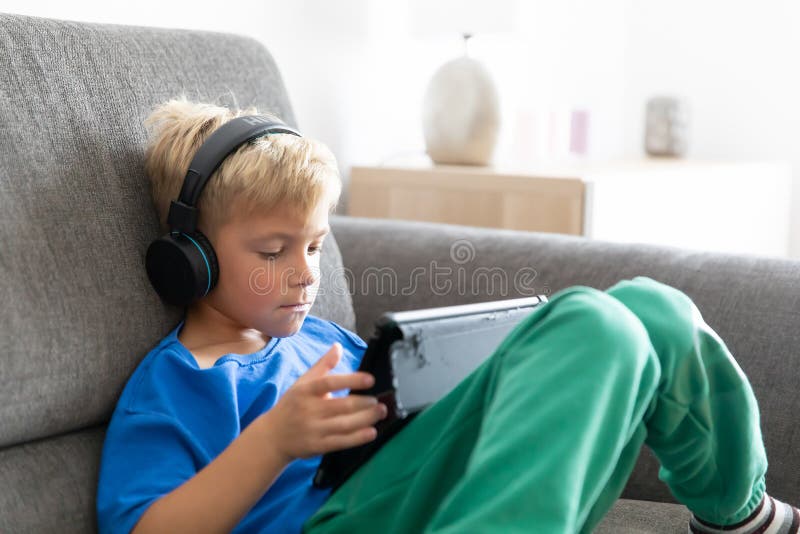 Little Boy Playing on Tablet Stock Image - Image of innocence, care ...