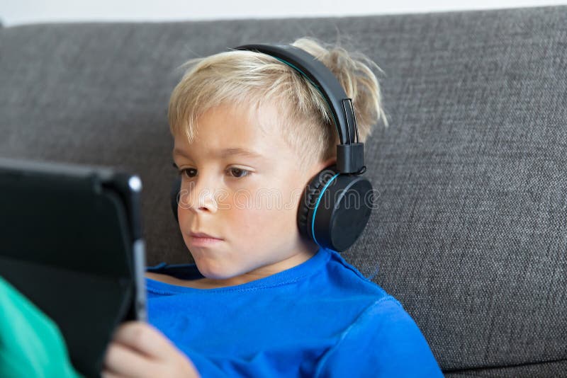 Little Boy Playing on Tablet Stock Image - Image of internet, afraid ...
