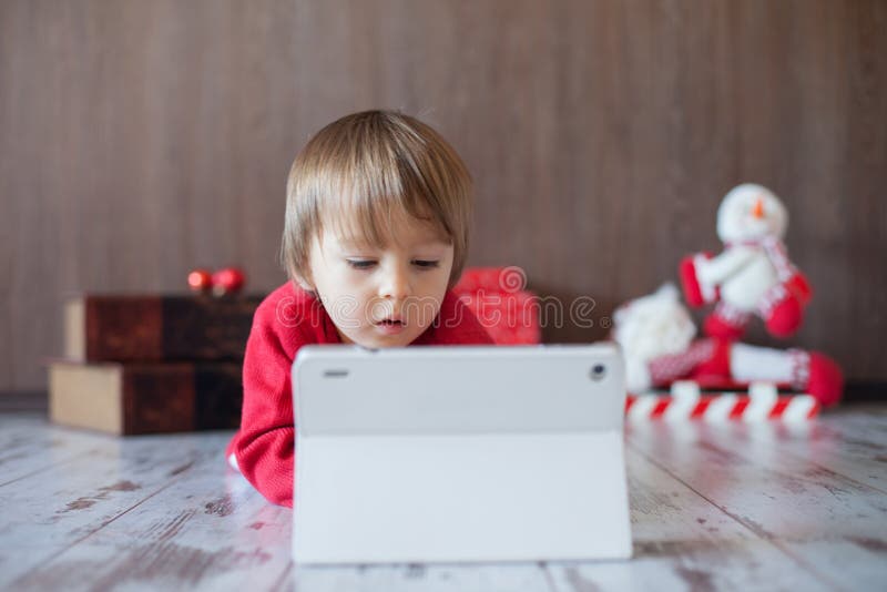 Little Boy, Playing on Tablet Stock Photo - Image of object, copy: 45106822