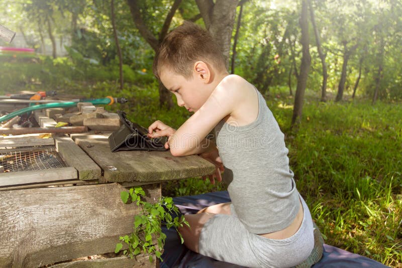 Boy playing on tablet stock photo. Image of leisure - 148121346