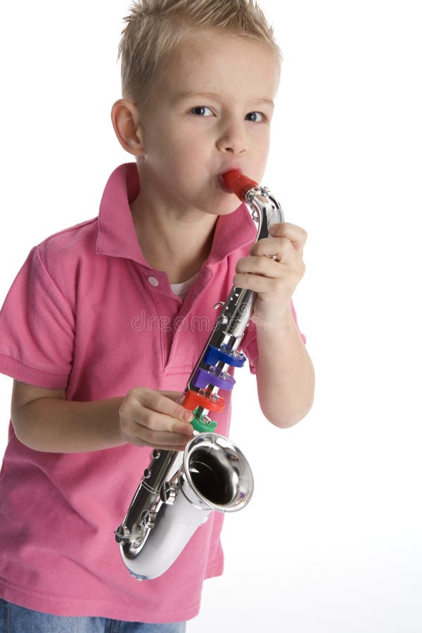 Little Boy Playing Toy Saxophone Stock Photo - Image of child ...