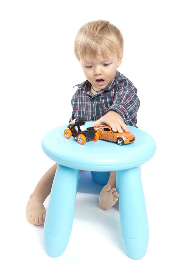 Little boy playing toys stock image. Image of people - 10538045