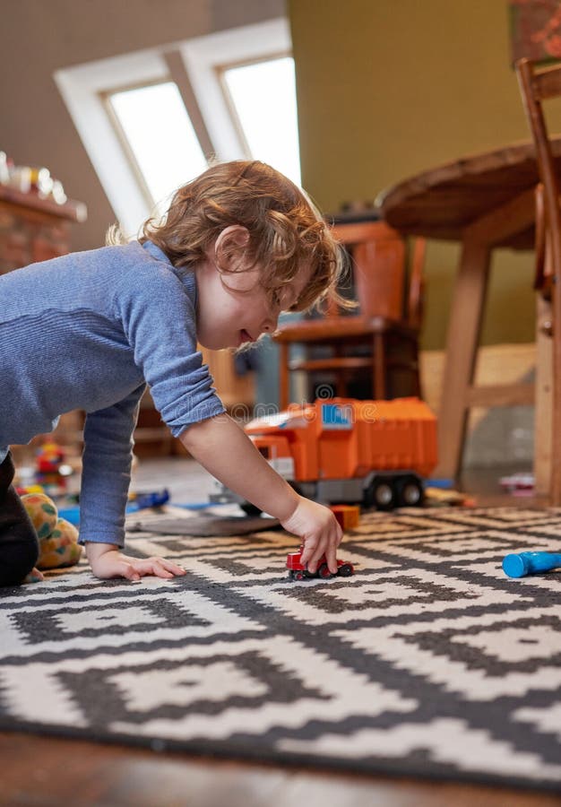 Little Boy is Playing with Toys in the Room Stock Photo - Image of ...