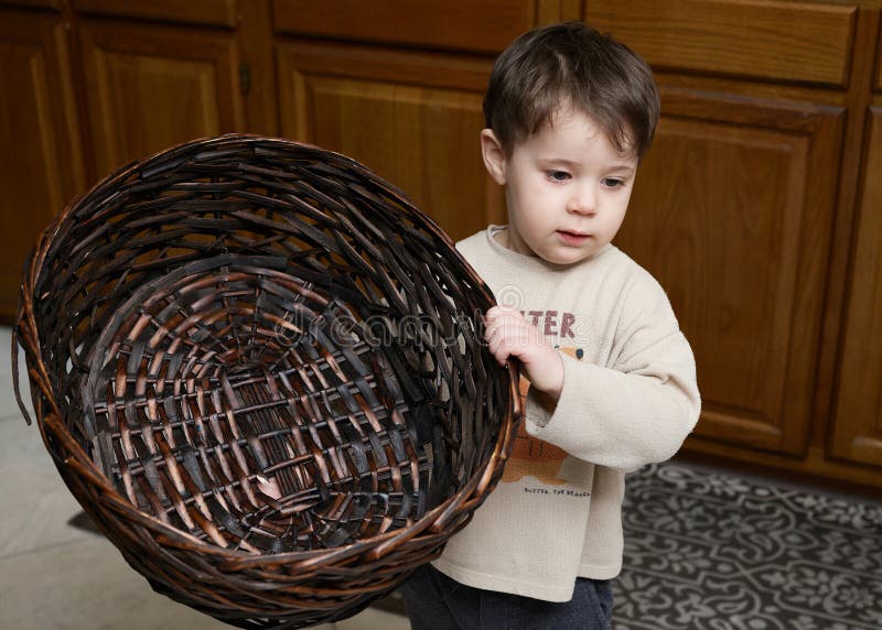 Little Boy Playing with a Whicker Basket Stock Image - Image of whicker ...