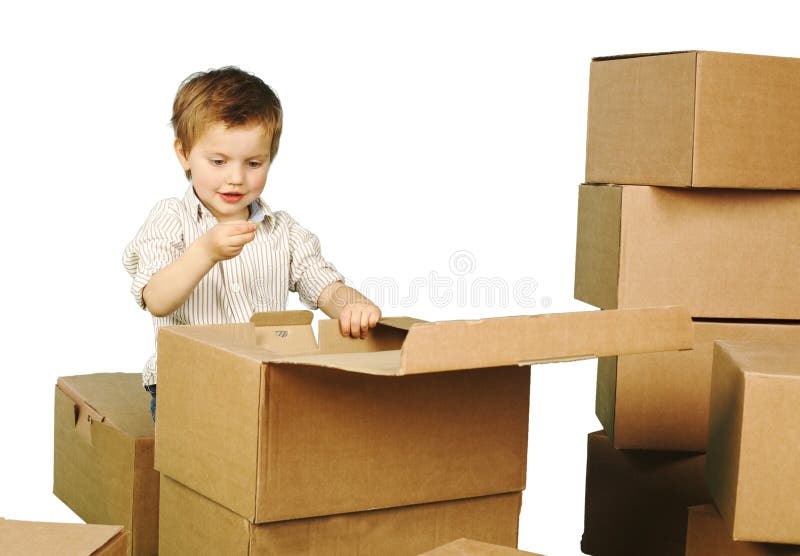 Little boy plays in boxes stock photo. Image of kindergartner - 39666576