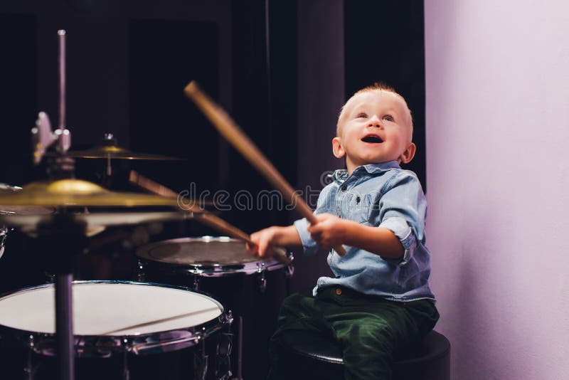 Little Boy Plays Drums in Recording Studio. Stock Image - Image of ...