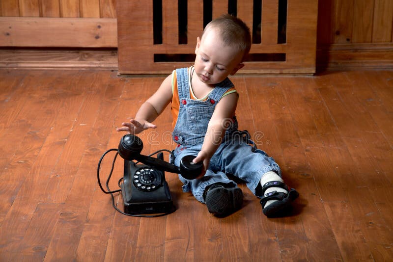 The Little Boy Plays Old Phone Stock Photo - Image of caucasian ... The Little Boy Plays Old Phone Stock Photo - Image of caucasian ...