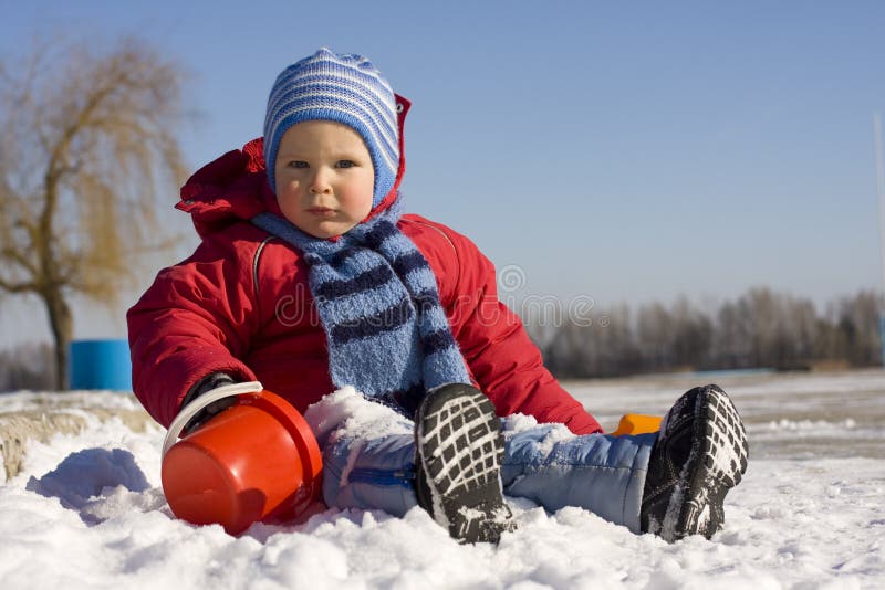 Little boy plays snow stock photo. Image of portrait - 33416486