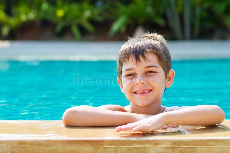 Little boy by the pool stock image. Image of swim, leisure - 20189577