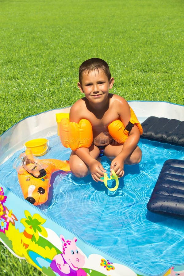 Little boy in the pool stock image. Image of sunlight - 43057469