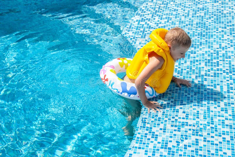 Little Boy in the Pool during Vacation Stock Photo - Image of swim ...