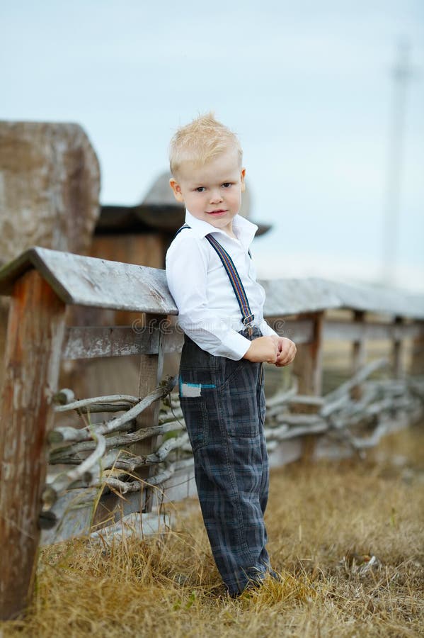 Boy hitch hiking at road stock photo. Image of little - 35007096