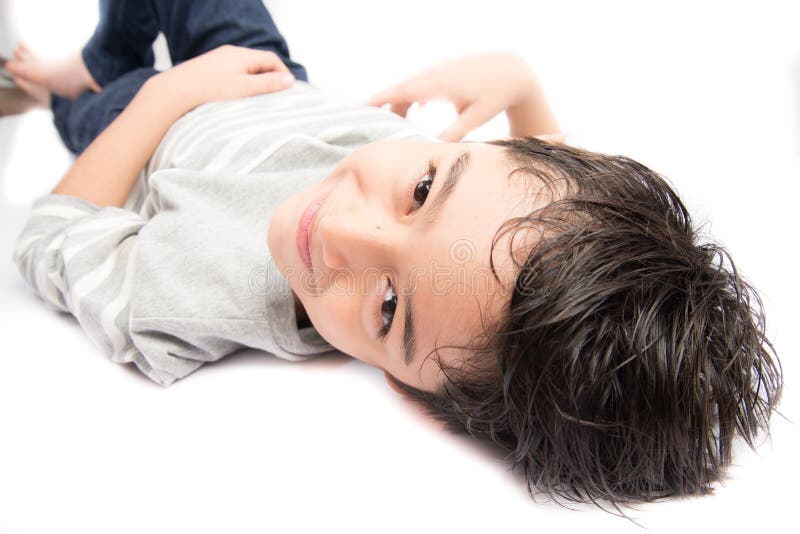 Little Boy Pose Portrait Lay on the Floor on White Stock Photo - Image ...