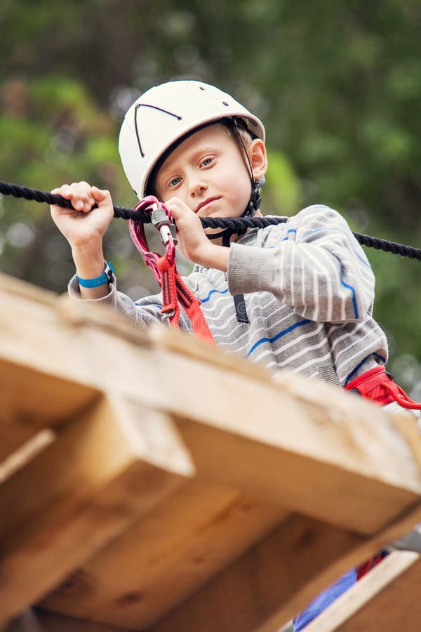 Little Boy Practicing on the Rope Track Stock Photo - Image of hobby ...